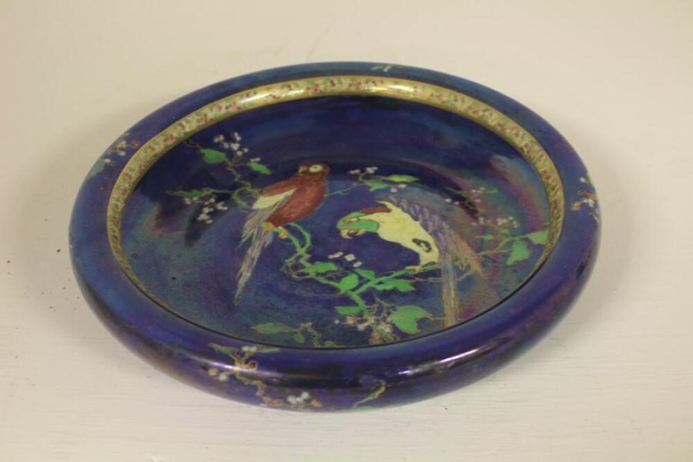 A Carlton Ware blue lustre bowl, circa 1920, decorated with hand ...