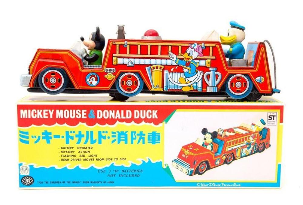 Mickey Mouse: A boxed, battery operated, tinplate, Mickey Mouse ...