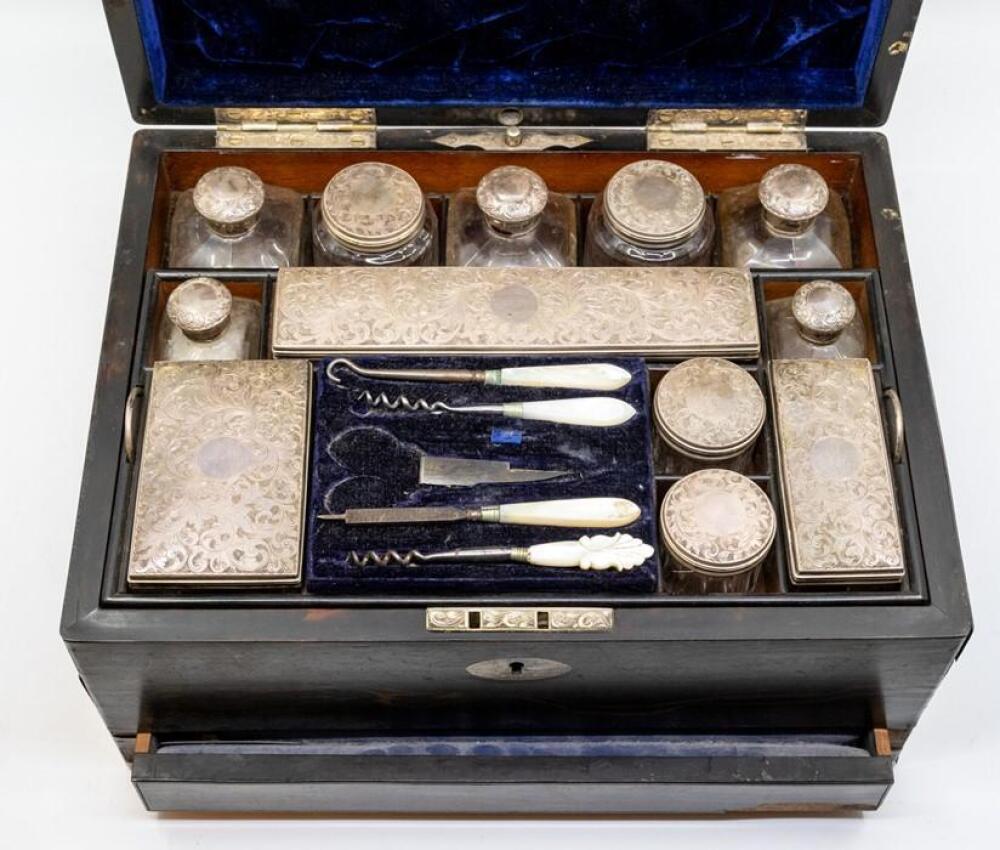 A early Victorian coromandel lady's dressing table box, the interior ...