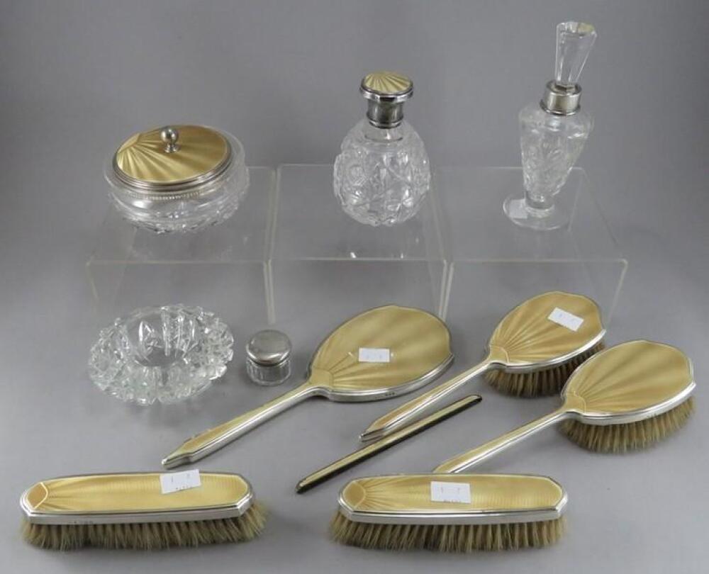 A silver and guilloche enamel Mappin & Webb dressing table set, to ...