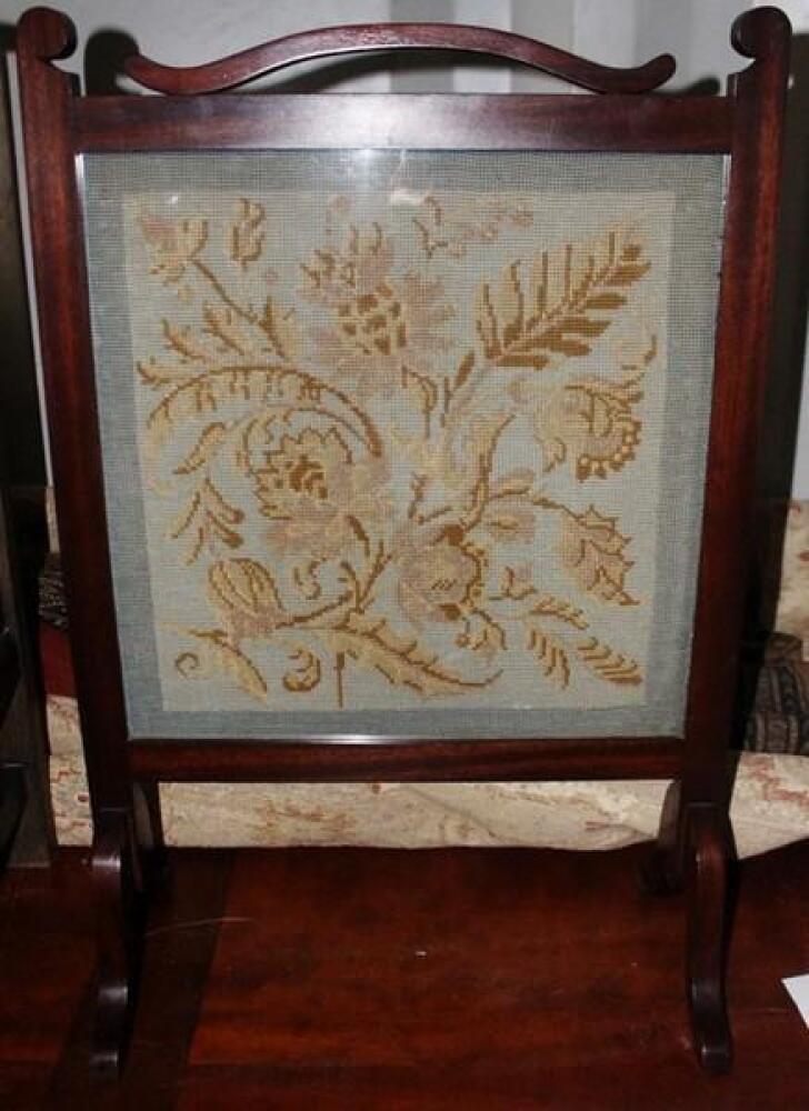 A Jacobean style oak hall unit, having two panelled doors and a drawer ...