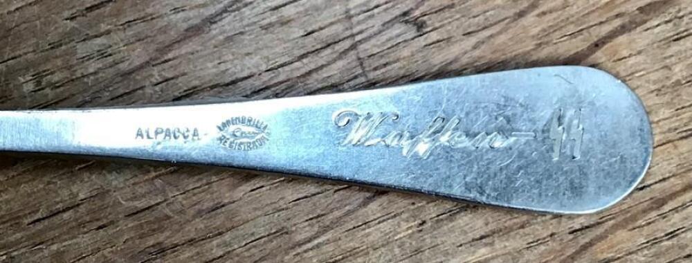 Four WW2 German tea spoons marked Waffen-SS.