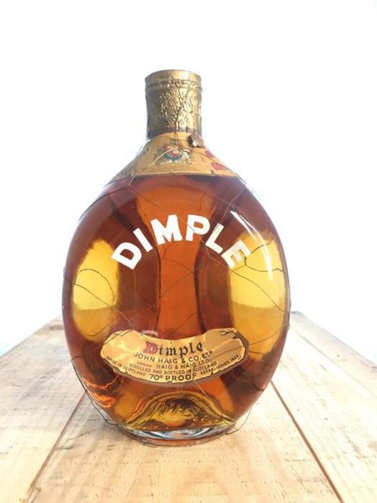 A bottle of Dimple Haige blended whisky, in the trademark bottle ...
