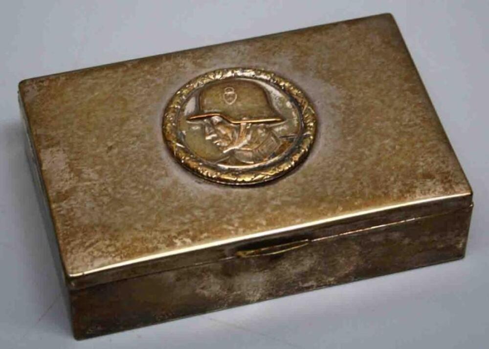 A German silver plated oblong cigarette box, the rising top has a ...