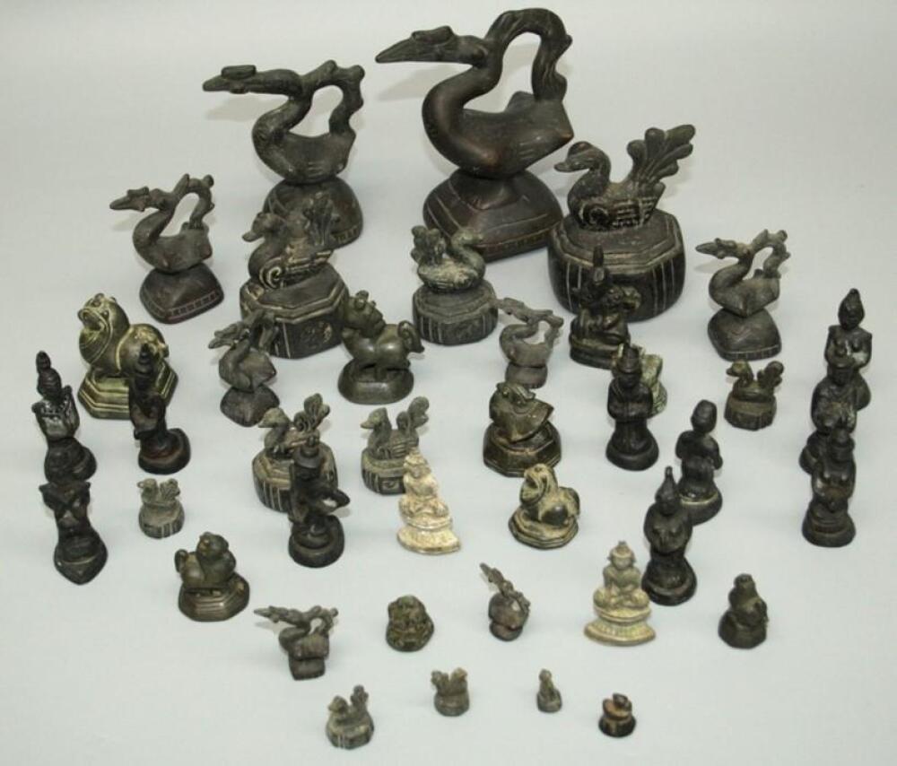A good collection of thirty eight 19th century Burmese bronze opium ...