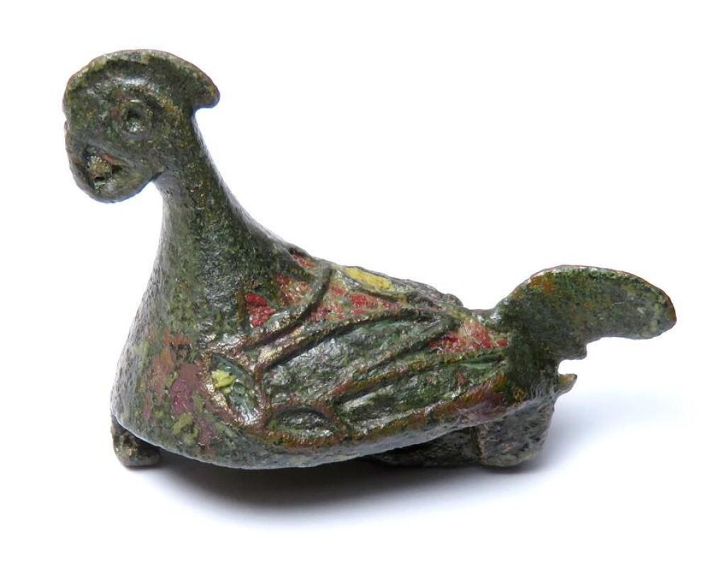 Roman chicken brooch. A three-dimensional zoomorphic plate brooch in ...