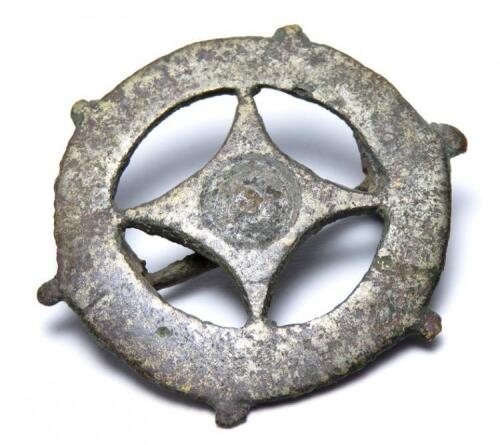 Roman openwork disc brooch with pin. A circular openwork disc brooch ...