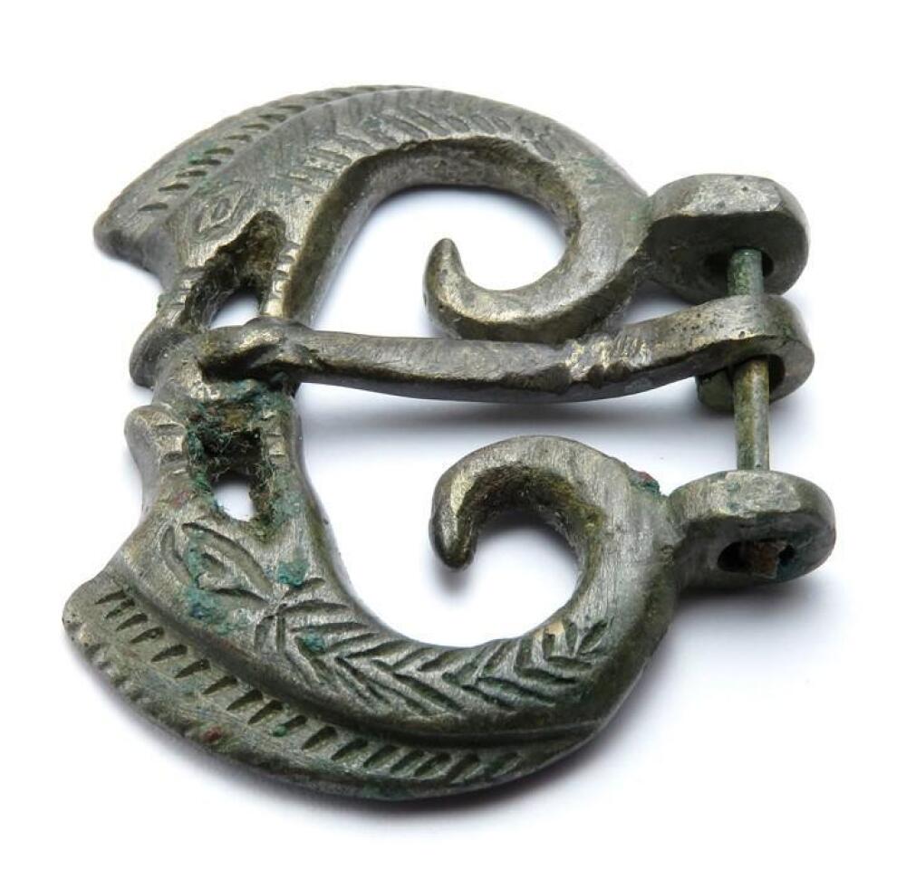 Roman military belt buckle featuring a pair of opposed boar or 'crested ...