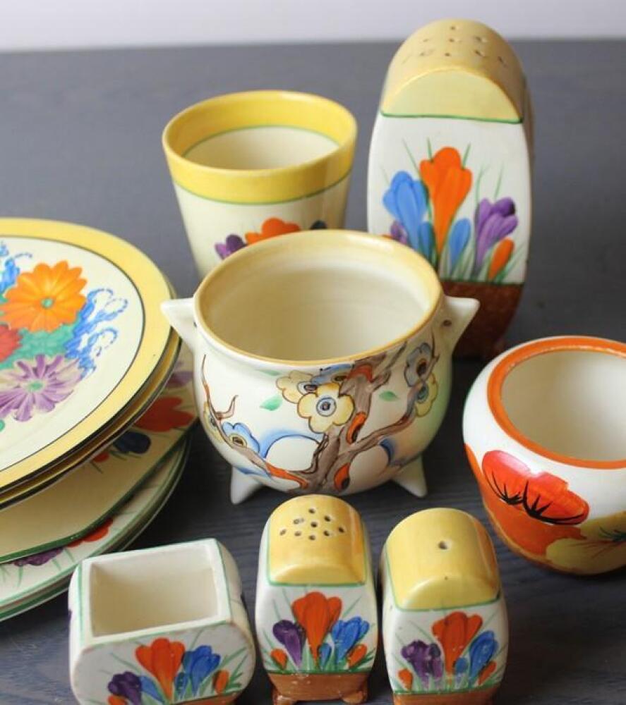 A collection of Clarice Cliff Bizarre pottery, mostly c.1930's, to ...