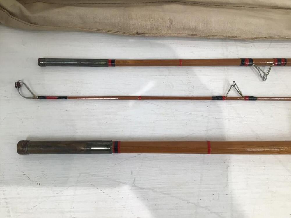 A vintage split cane three piece fishing rod, in original cover (1)