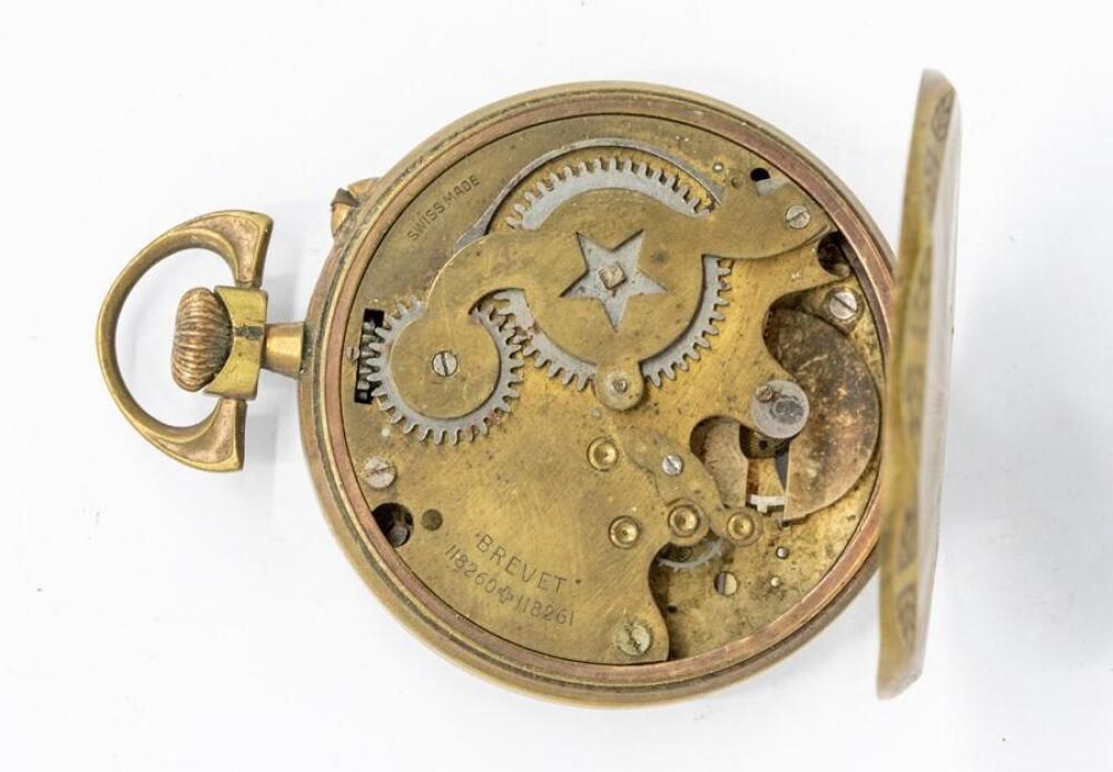 A French Amida brass octagonal open faced pocket watch, the dial ...