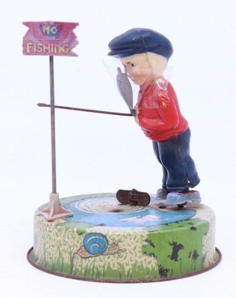 Mettoy: An unboxed Mettoy tinplate 'Billy the Fisherman' clockwork toy ...