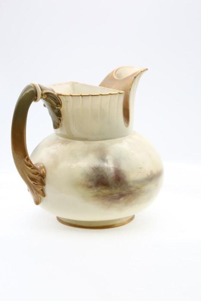 A Royal Worcester shape no: 1438 globular jug, with gilt spout and ...