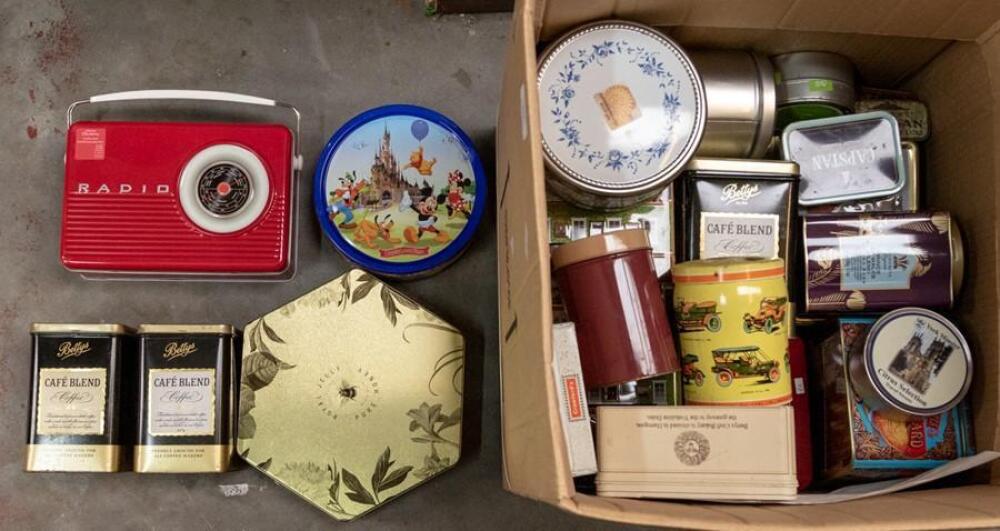 A collection of tins, some vintage and modern