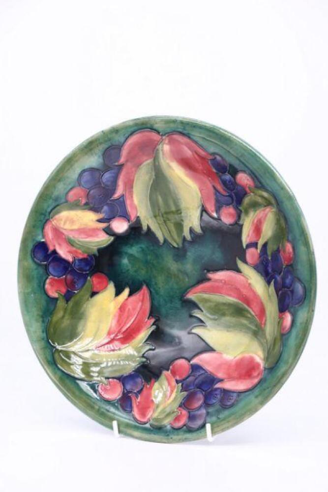 MoorcroftﾠLeaf and Berry on green ground vase, 8cms high approx 25cm in ...