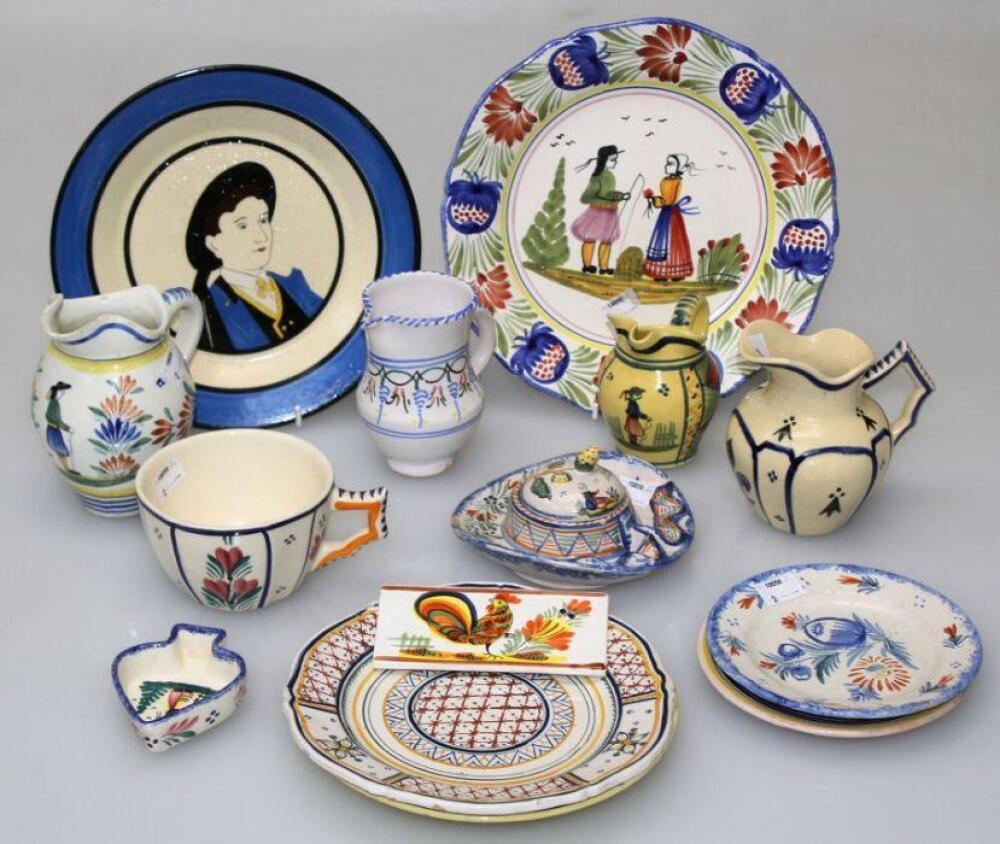 A quimper plate, decorated with a young scholar, a Quimper inkstand ...