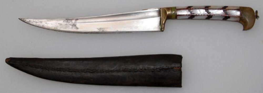 A 19th century Persian dagger with curved steel blade and horn mounted ...