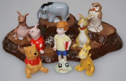 A set of eight Beswick Walt Disney Winnie the Pooh figures, 5 to 13cm ...