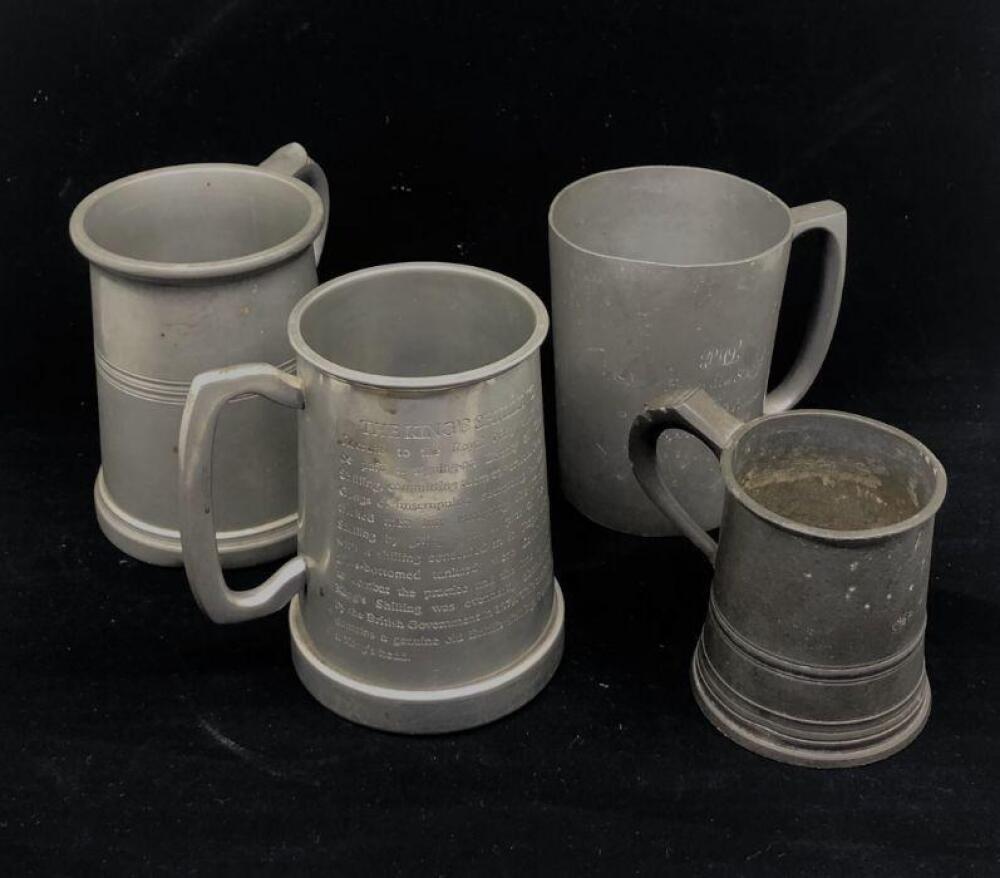 Four pewter tankards, of differing sizes