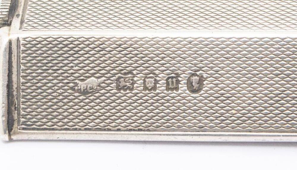 An Art Deco silver cased Parker Beacon diamond shaped lighter, stamped ...