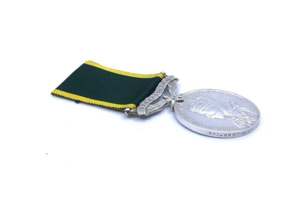 A George V Efficiency Medal with Territorial Bar, awarded to Sjt. J.I ...