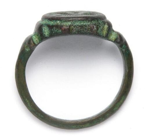 Roman Ring. Circa, 4th century AD. A bronze finger ring with a circular ...