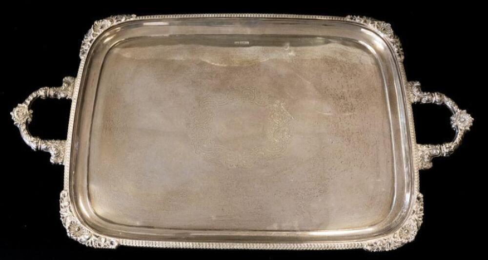A George V silver large two handled tray, gadroon border with scrolling ...