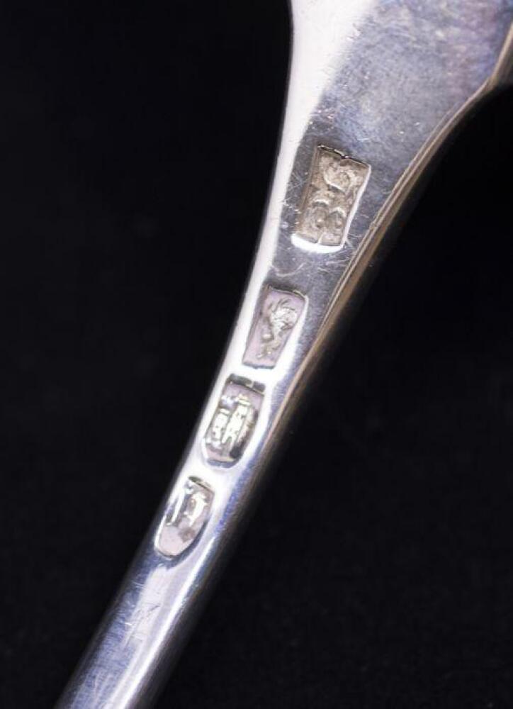 A George III Provincial silver Old English Pattern soup ladle, the ...
