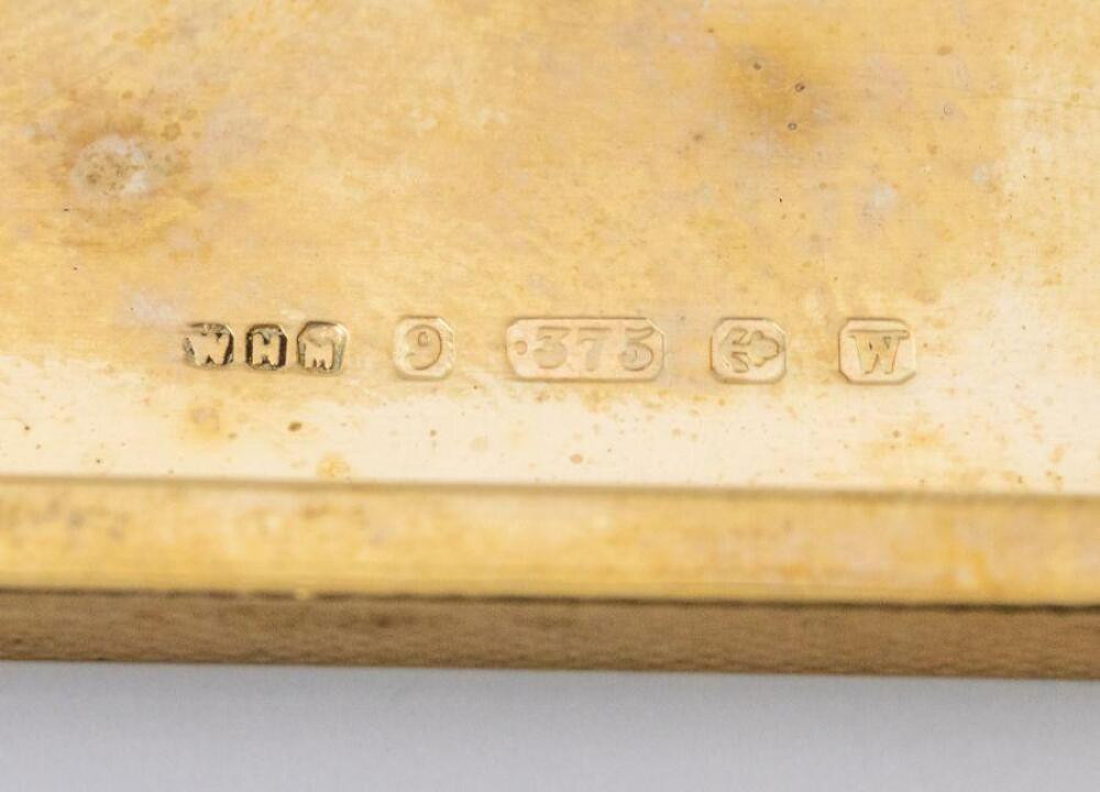 A George VI 9ct gold cigarette case, engine turned decoration, approx ...