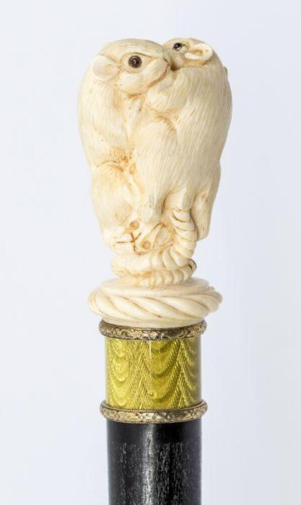 A Russian ivory, silver and gold mounted walking cane, style of Fabergé ...