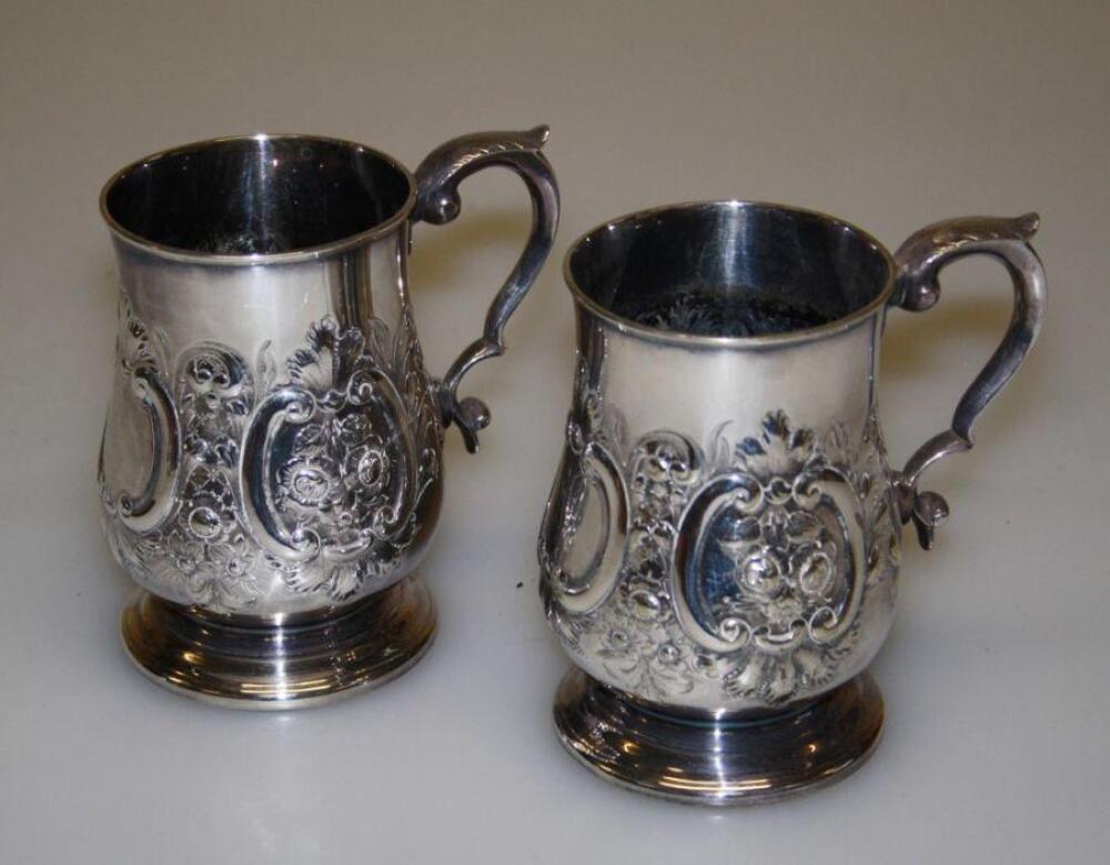 A pair of 19th century silver plated on copper baluster form tankards ...