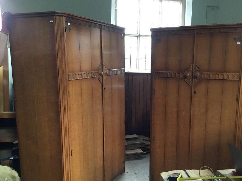 Two Austinsuite wardrobes both in honey oak with carved frieze leading ...