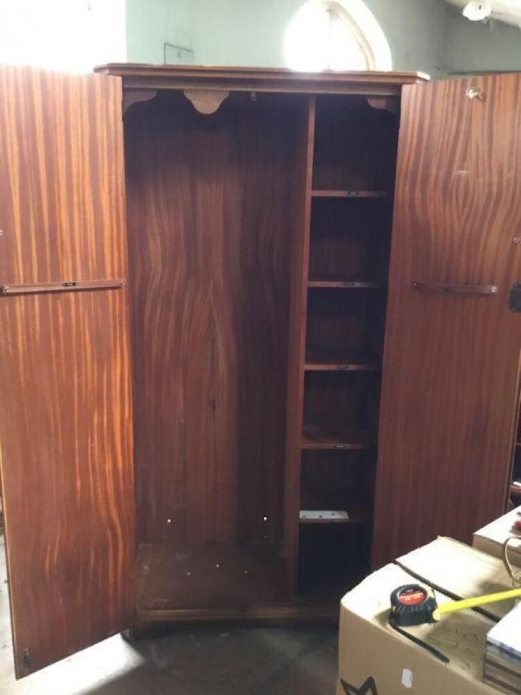 Two Austinsuite wardrobes both in honey oak with carved frieze leading ...