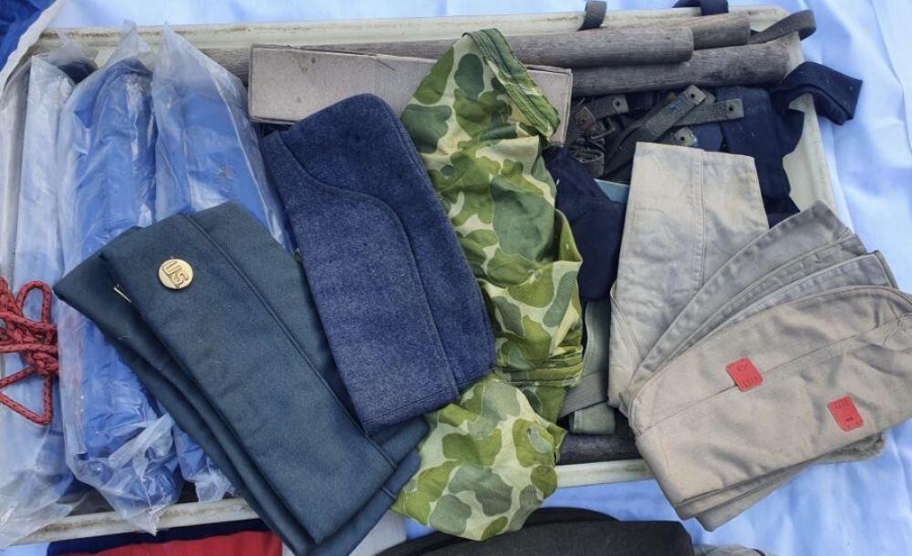 A tray of military flags, sundries and caps AF