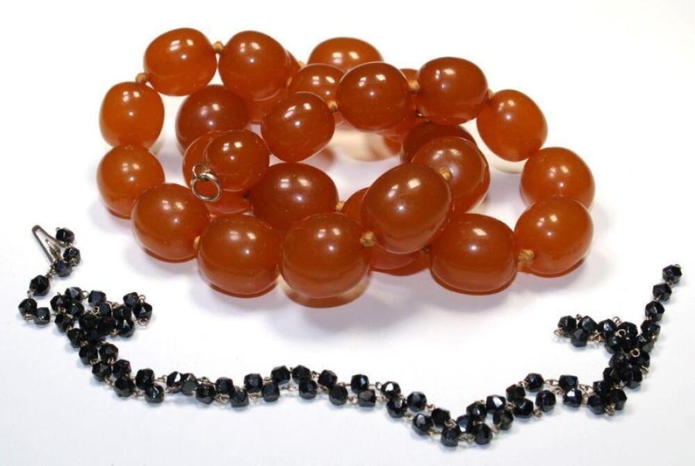 A graduated amber type necklace(subject to testing) together with a ...