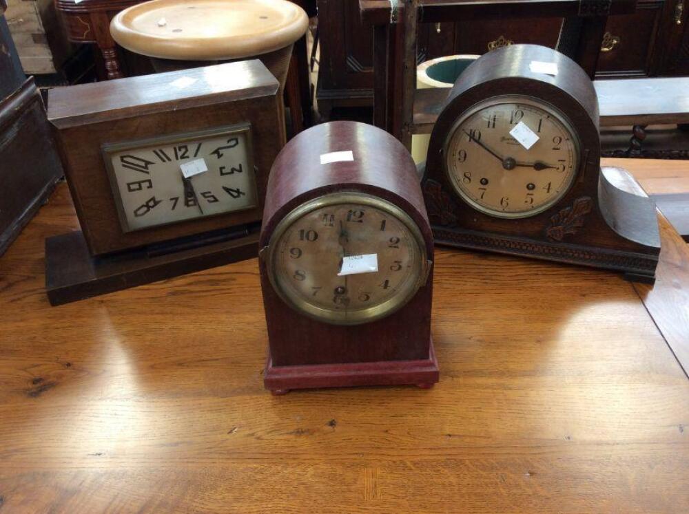 Three mantel clocks. 1. Bravingtons Ltd, Kings Cross, London. Two-train ...