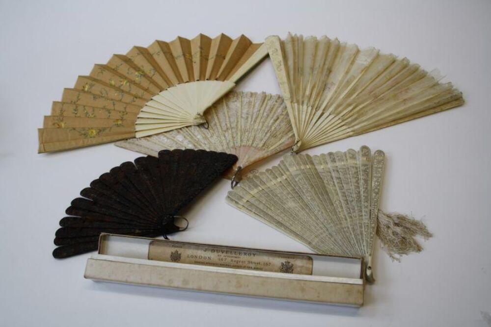 J Duvelleroy, an early 20th century lace fan with painted floral sprigs ...