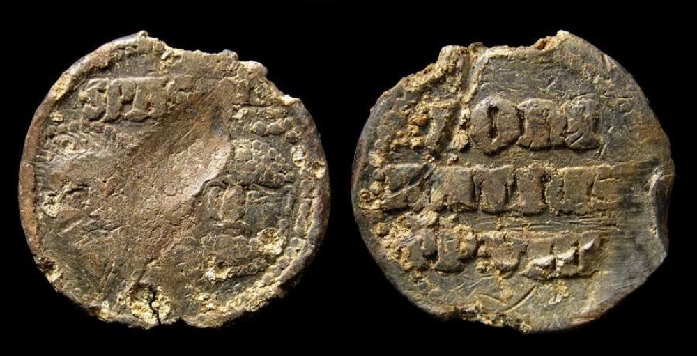 Medieval, lead-alloy papal bulla of Pope Boniface VIII, dating c. 1294 ...