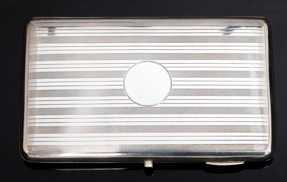 A George V large silver cigarette case, engraved with striated pattern ...