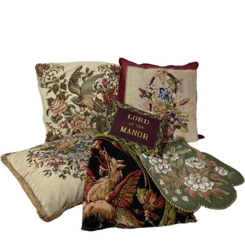 Three needlework cushions and one with an embroidered front, a piece of ...