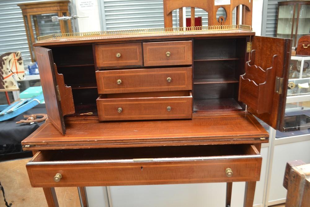 Edwardian ladies desk, with gallery top above four central drawer ...