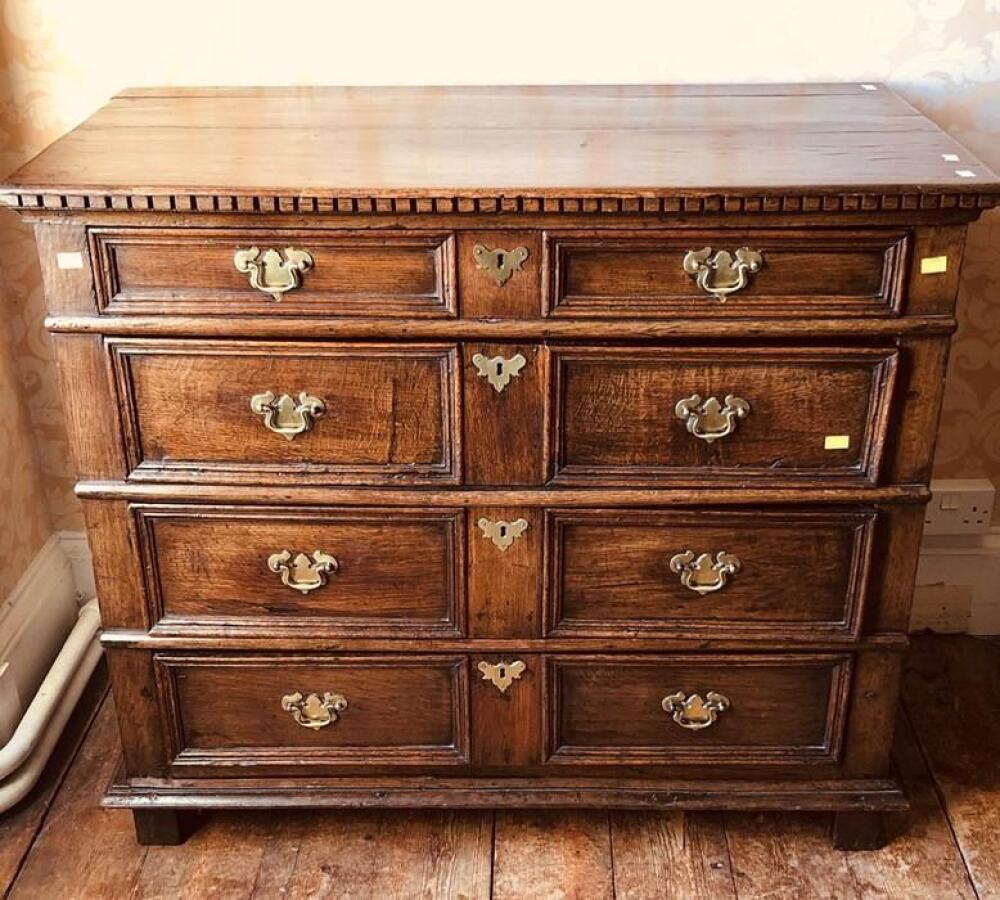 An Early 18th century oak chest of drawers, circa 1715, rectangular top ...