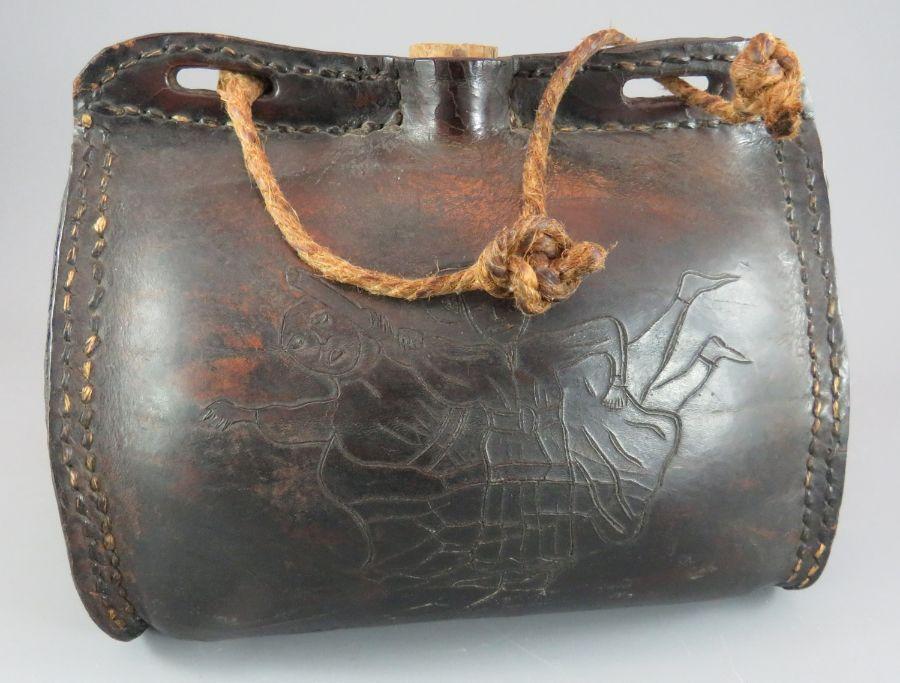 A really good nineteenth century stitched leather costrel with engraved ...