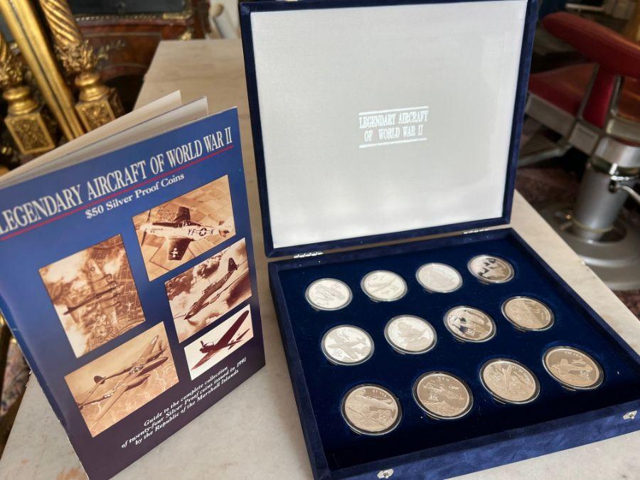 A set of 12 x $50 proof Legendary Aircraft of World War II coins issued ...