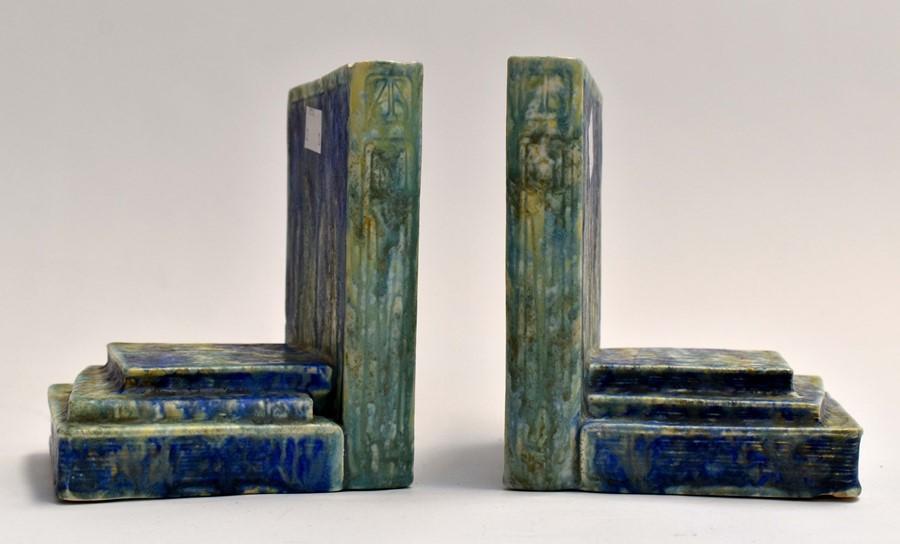 A pair of Bretby art pottery book ends, height approx. 15cm. Chips to ...