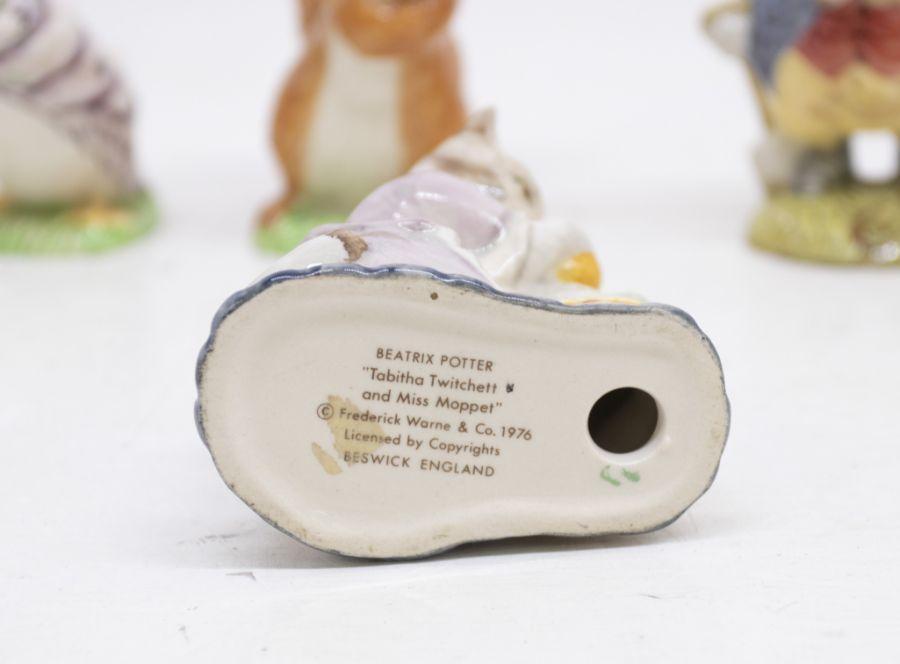 Four Beswick Beatrix Potter figures, Jemima Puddleduck, Squirrel Nutkin ...