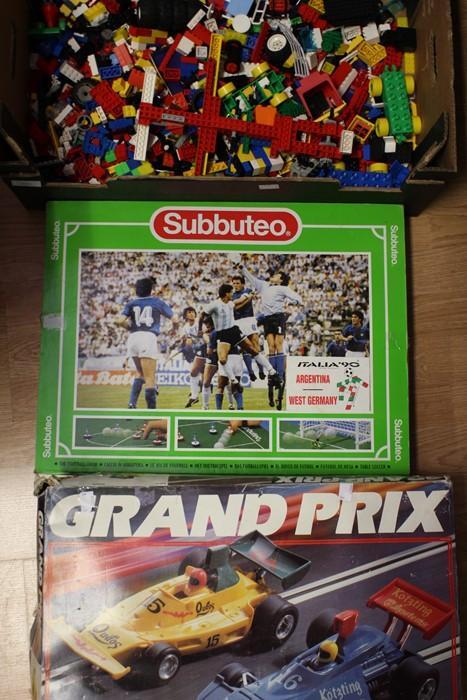 A boxed Scalextric Grand Prix Set, a boxed Subbuteo set 60240, and a ...
