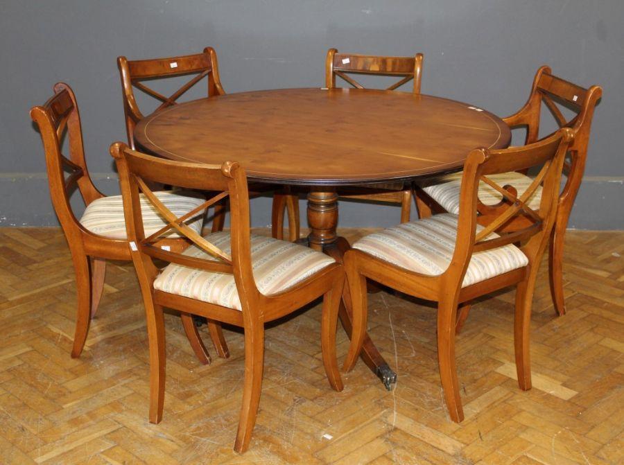 A small, good quality reproduction yew veneer tilt top breakfast table ...