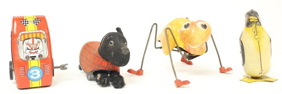 Tinplate: A collection of assorted tinplate items to include: Triang ...