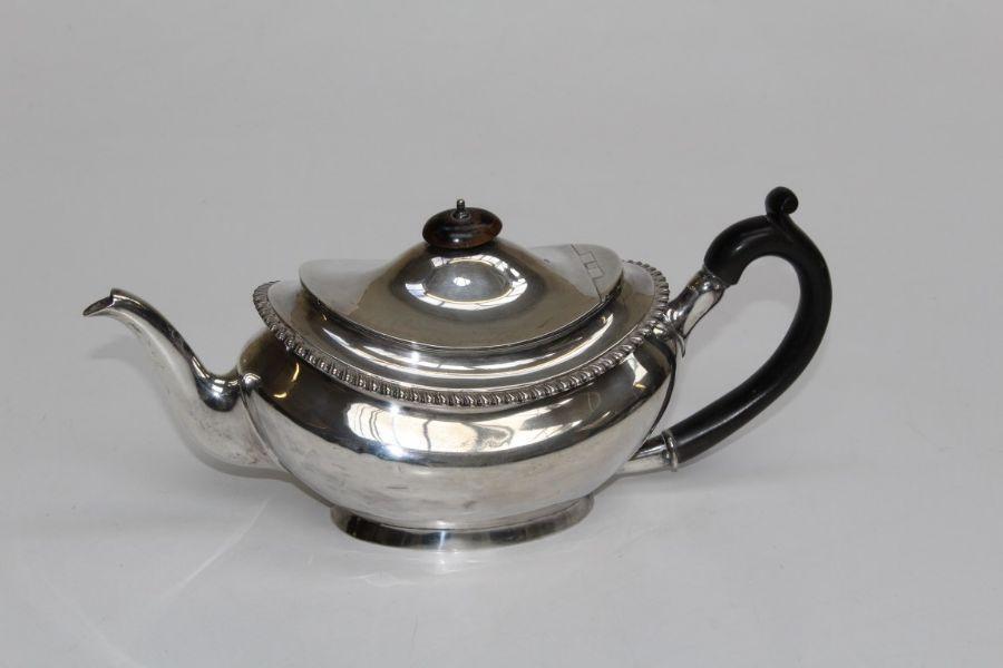 Allen and Daws, Norwich, an Edwardian silver teapot of oval shape, with ...